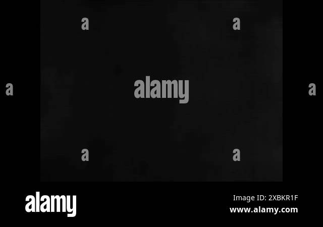 A United States Army Air Forces instructor teaches in a classroom and ...