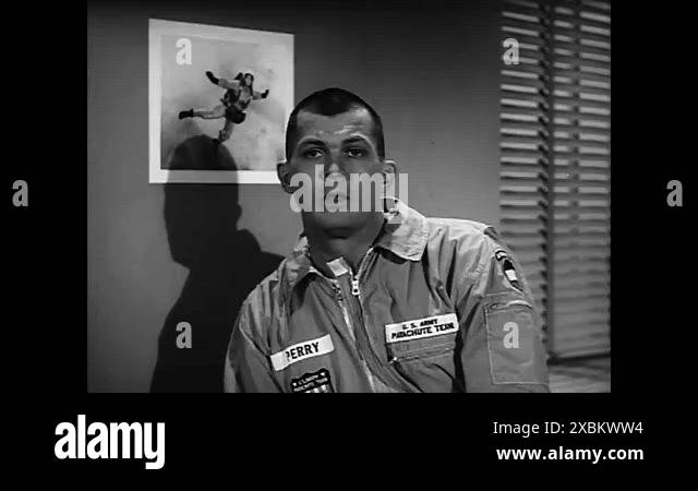 A captain in the U.S. Army Parachute Team shows a model of a Leonardo ...