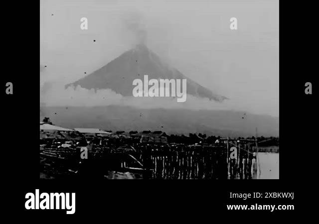 The Biliran volcano erupts and natives are shown as well as lava and ...