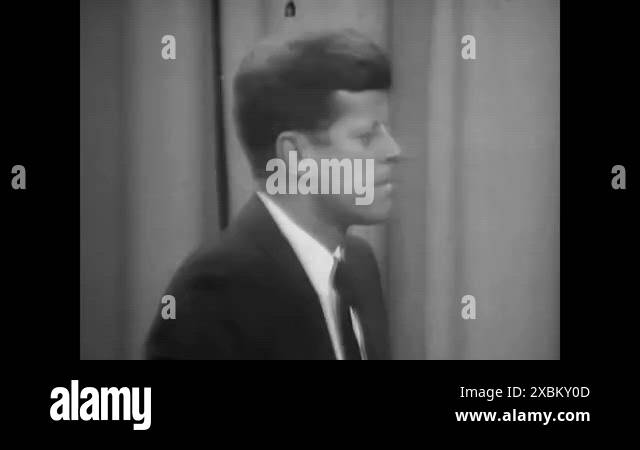 President John Fitzgerald Kennedy answers a question to do with the ...
