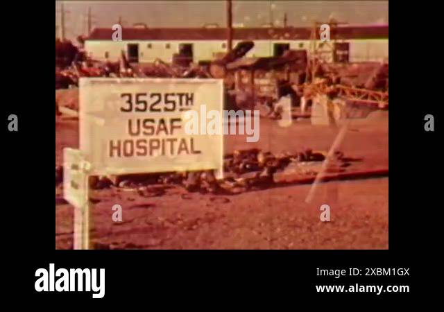 An injured pilot is shown at the 3525th USAF hospital and he recalls a ...