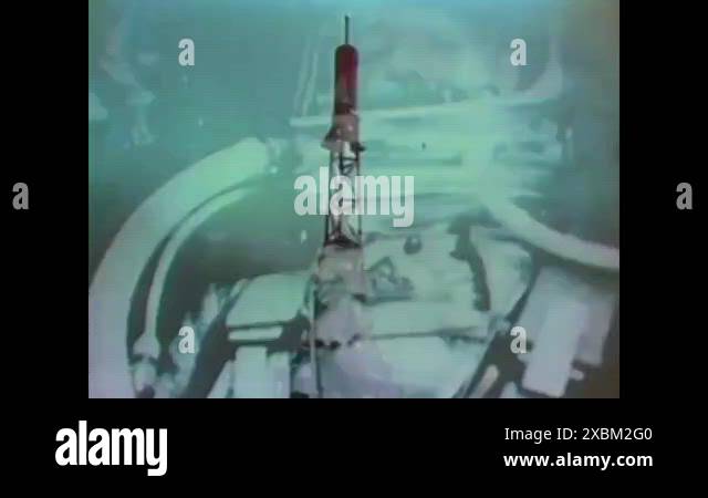 Astronaut Alan Shepard is shown aboard the Freedom 7 spacecraft as it ...