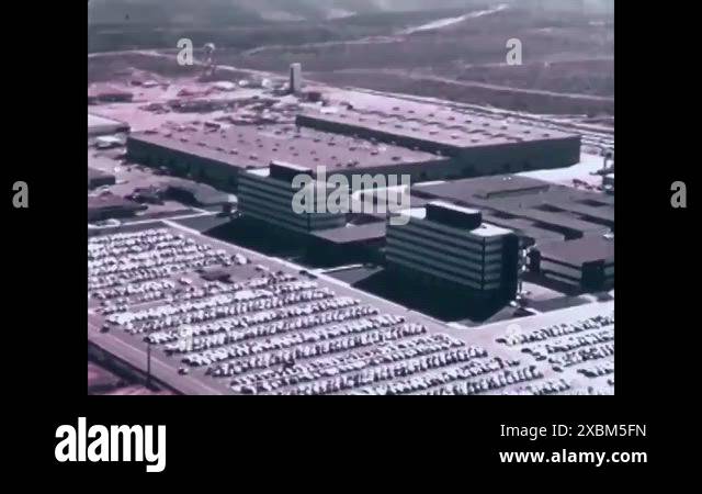 1960 - NASA's Centaur satellites are worked on, while the head engineer ...