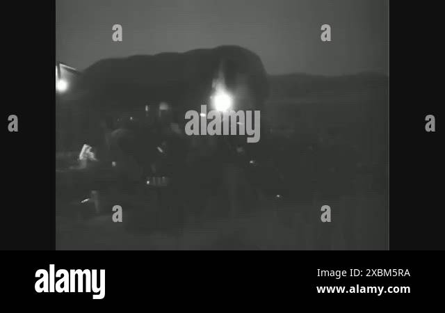 1957 - A chaplain talks to two nervous soldiers participating in ...