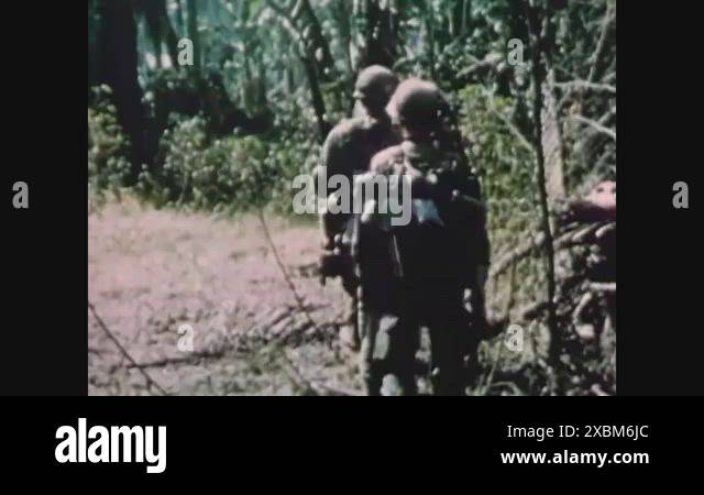 1969 - American soldiers find a dead Vietnamese soldier and use a ...