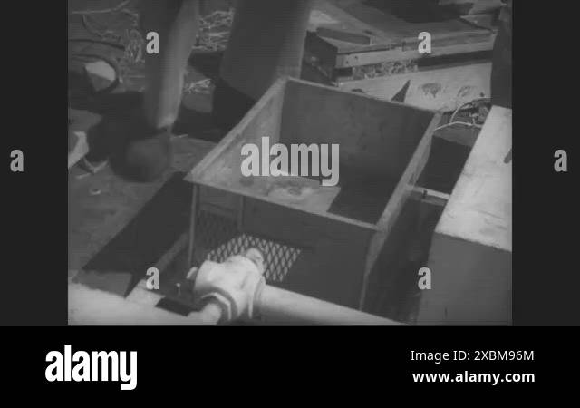 1946 - Sailors set up crates for rats aboard a ship, and the mushroom ...