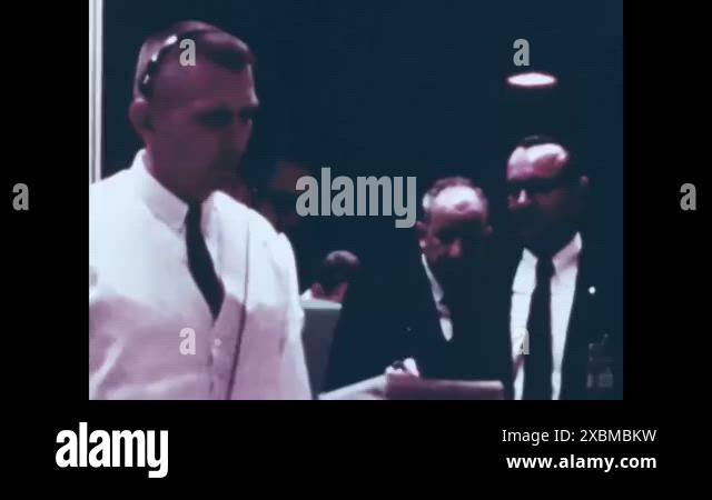 1967 - Mission control directs an Apollo space craft during its re ...