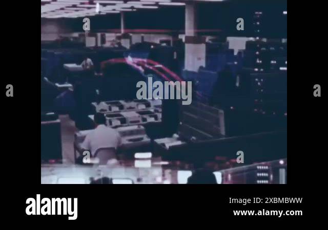 1967 - The mission operations control room and staff support room of ...