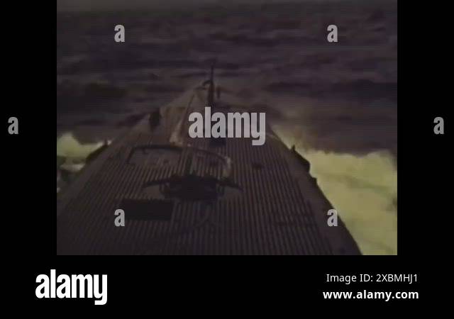 1958 - Commander Howard Gilmore goes on deck of the USS Growler to make ...