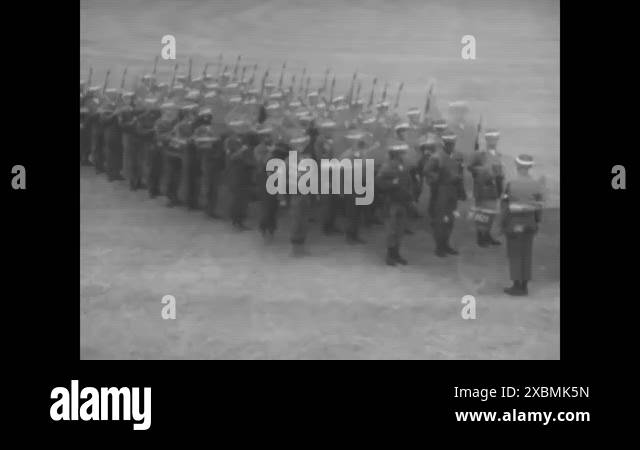 1967 - Military vehicles and soldiers demonstrate how to coordinate a ...