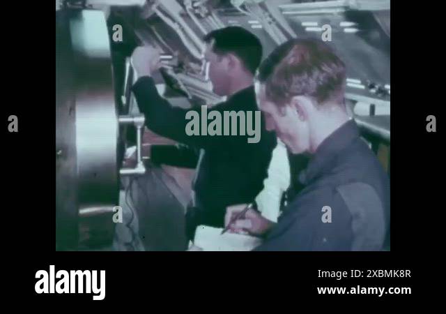 1971 - Crewman man a launch tube complex and a Polaris ballistic ...