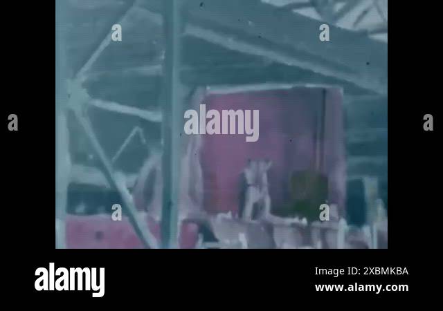 1950 - A signalman signals and sailors man the nuclear-powered USS ...