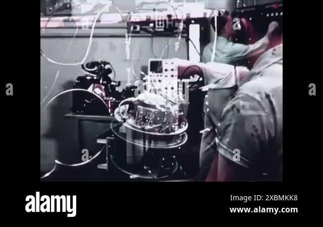 1956 - Aerospace workers test a gyro for an autopilot system as well as ...