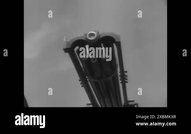 1957 - Officers fire a Vulcan and a lightweight machine gun Stock Video ...
