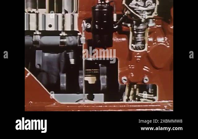 1953 - A farmer works acreage with a Ford Golden Jubilee tractor, and a ...