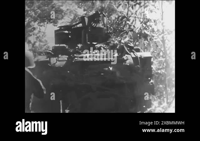 1943 - American soldiers advance into the jungle and begin battle in ...