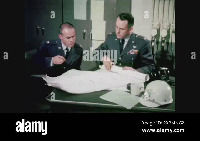 1962 - An officer explains operations at the command post of the USAF ...