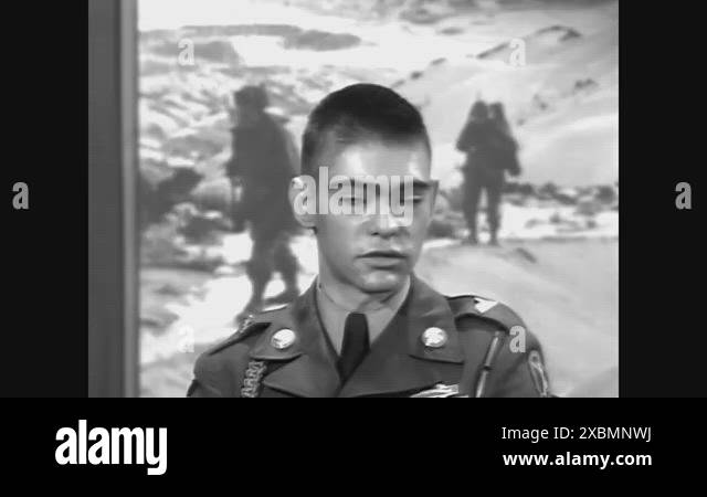 1951 - Captain Carl Zimmerman interviews a corporal about his experience as a POW captured by ...