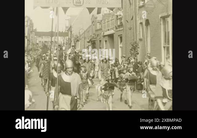 1927 - Townspeople follow the end of the historic procession ...