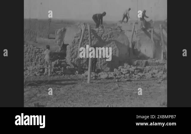 1916 - Federal soldiers search buildings and shoot rifles from a trench ...