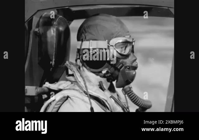 1944 - A US Navy pilot wears an oxygen mask while flying, and a ...