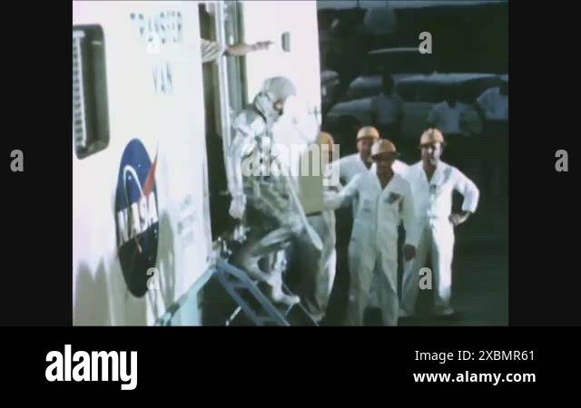 1963 - Astronaut L. Gordon Cooper salutes and shakes hands with a ...