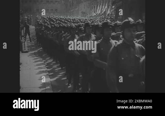 1940s - Footage of Nazi soldiers marching and Hitler's supporters cheering is intercut with ...