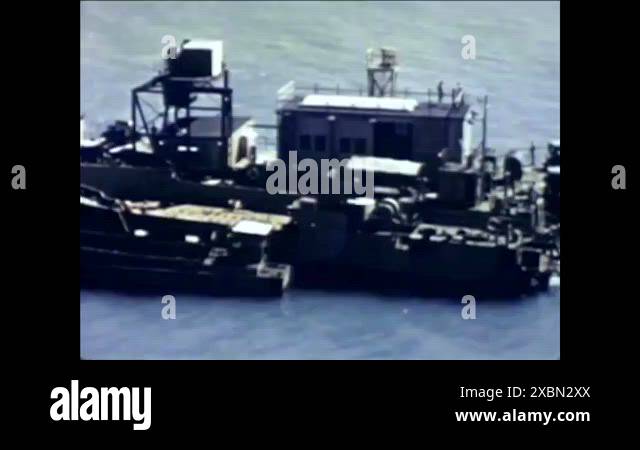 1954 - A nuclear device is detonated from a firing barge and the ...