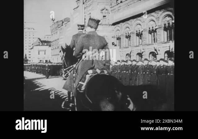 1940s—A large group of Russian citizens gather in a square, and Josef ...