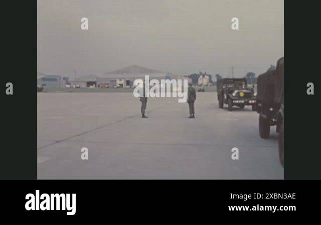 1967— Air Force personnel wait to board military aircraft at the ...