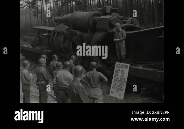1945 - General Patton is seen inspecting the world's largest gun in a ...