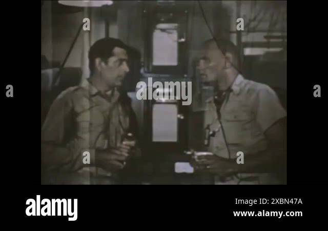 1952 - An officer talks about Operation Ivy in a control room aboard ...