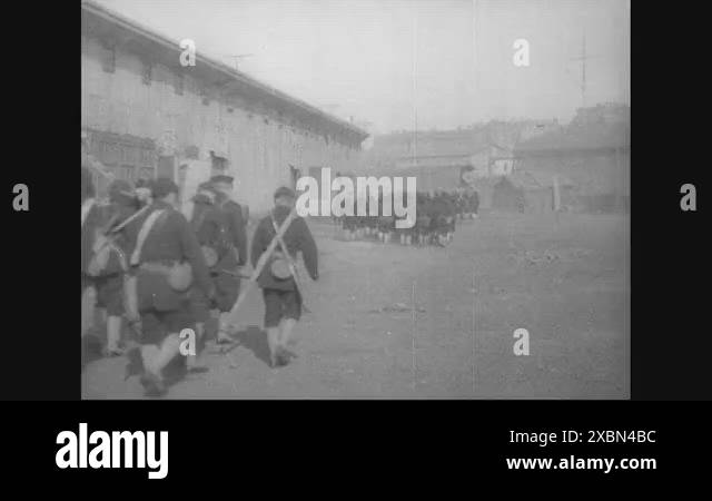 1910s - Allied troops march and board a ship, and artillery is fired by ...