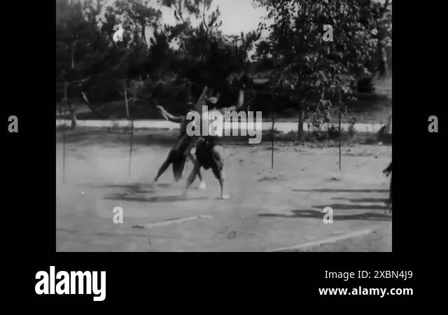 1936 - Filipino men dance around warriors who fight with a spear and a ...
