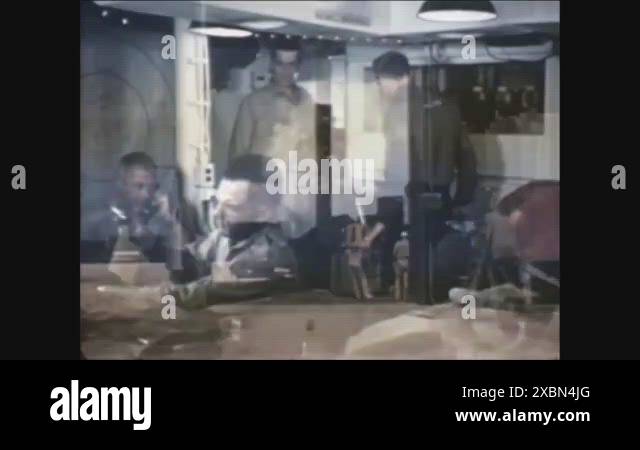 1952 - The busy joint operations room is shown aboard the USS Estes ...