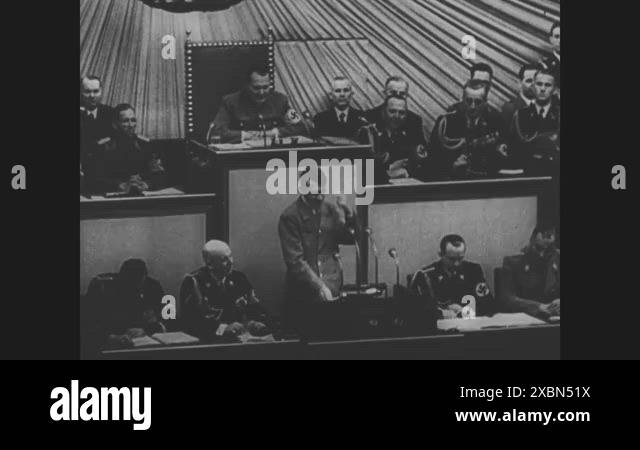 1940s - Adolf Hitler delivers a speech, Nazi generals formulate a point ...