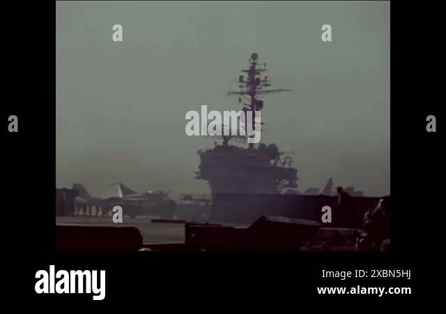 1970s - A Naval officer sings and plays the guitar, various activity ...