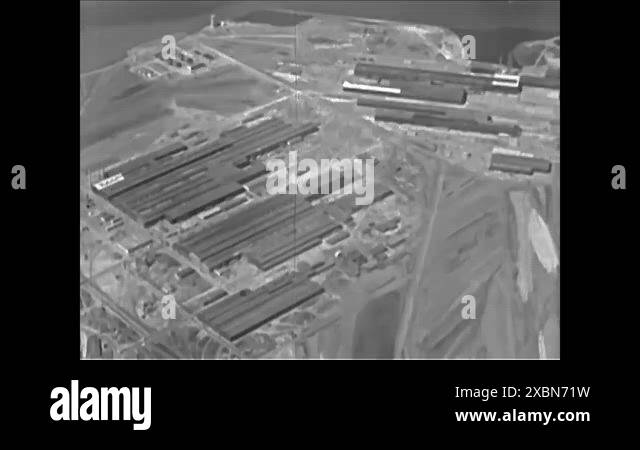 1960 - An aerial view is shown of a Japanese steel mill built on the ...