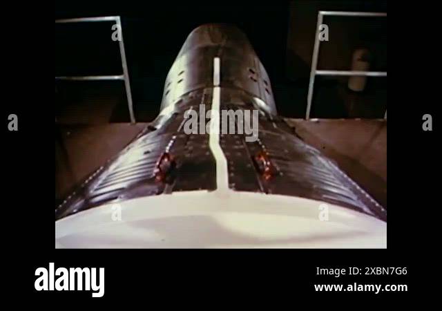 1964 - The re-entry module of a Gemini space craft is shown, and its ...