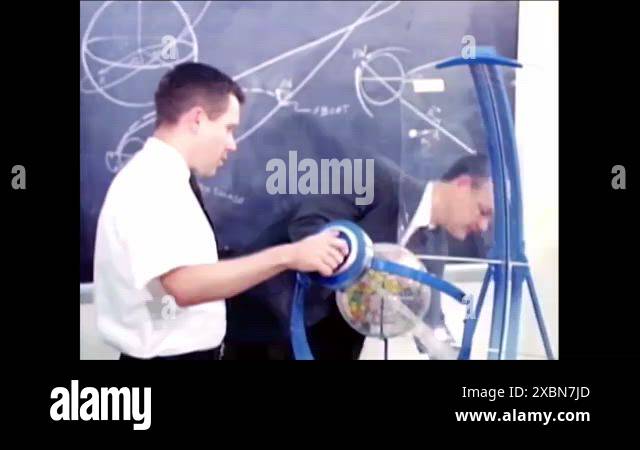 1966 - Two NASA scientists work on plotting a trajectory to the moon ...