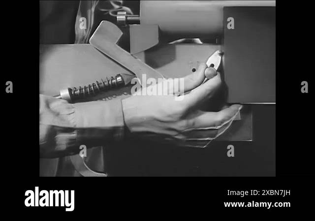 1945 - A large-scale model is used to show how a mechanism functions ...