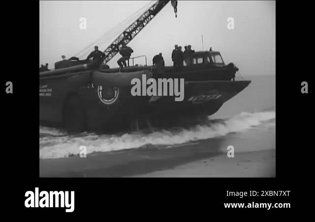 1956 - The amphibious BARC operates as both a cargo carrier and a troop ...