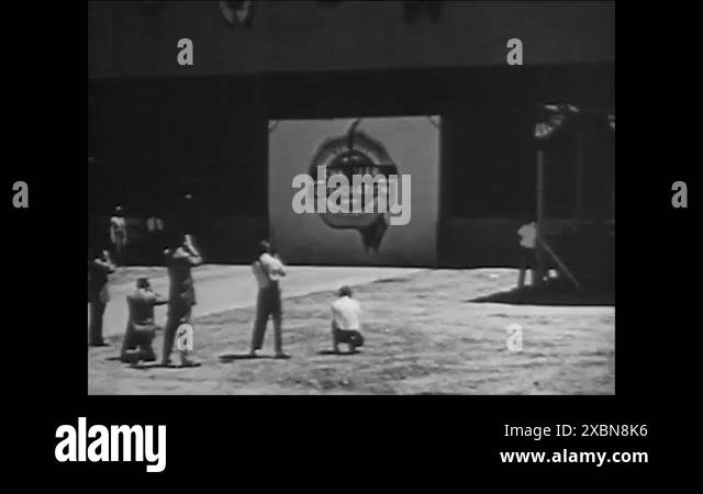 1950 - A 90 mm gun and a machine gun are shown on an M48 Patton main ...