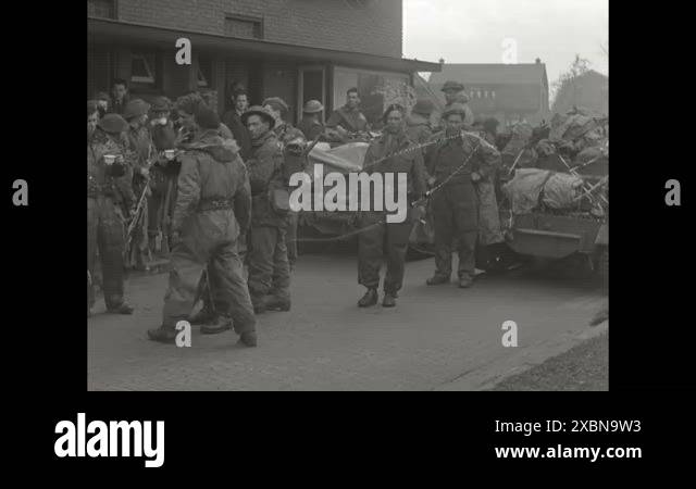 1940s - Soldiers stand guard, Nazi prisoners are captured, and military ...