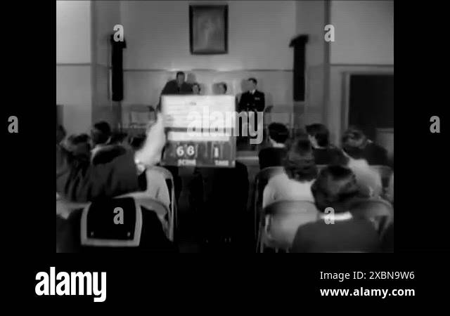 1956 - Japanese women receive certificates at a ceremony headed by ...