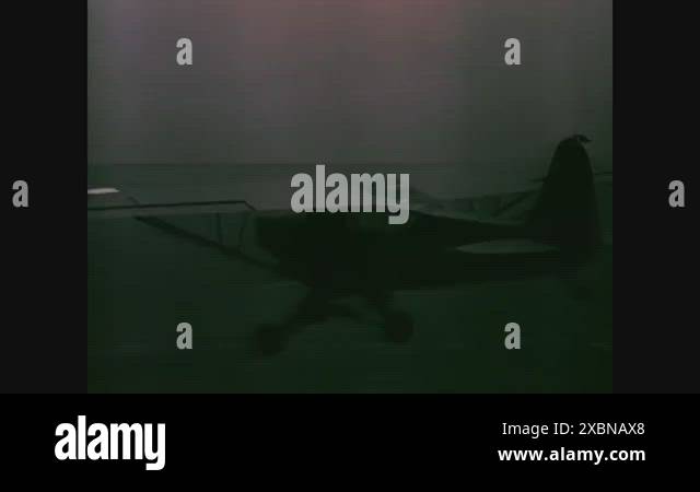 A reporter talks about the birth of army aviation next to an old L4 ...