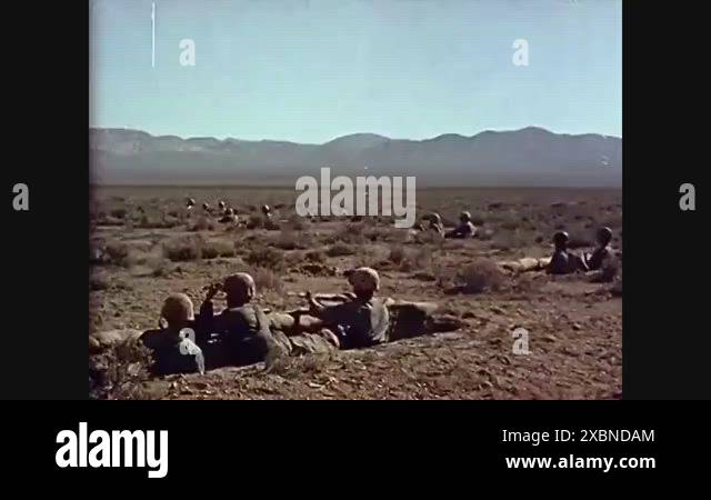 Soldiers hide in trenches during nuclear bomb preparation activities at ...