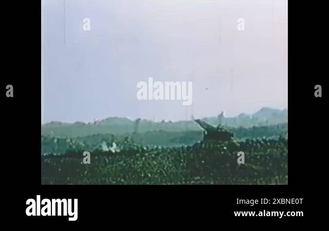 An Atomic Cannon fires a Mark Nine Shell and the ensuing explosion ...