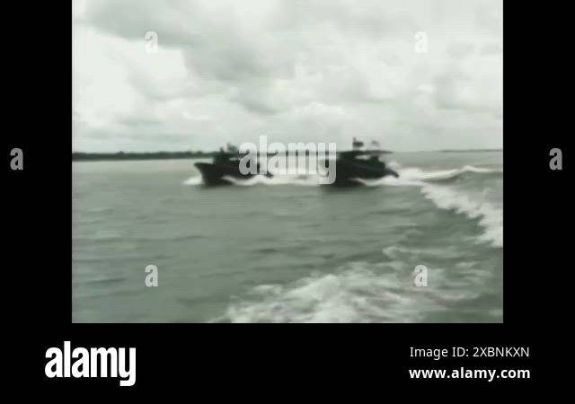 The U.S. Navy River Patrol Boat investigates and attacks a suspicious ...