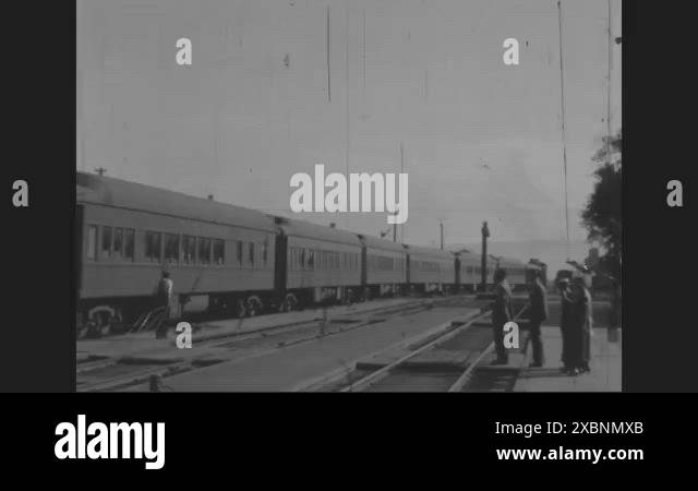 1935 - People board a train and travel to Yellowstone National Park, in ...